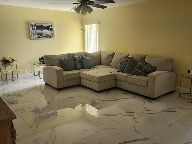 6311 NW 71st Ave, Tamarac, FL 33321 | MLS #A12028
