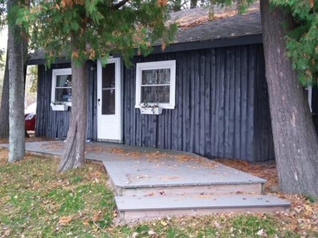 6386 Tricks Way Dr, Kewadin, MI 49648