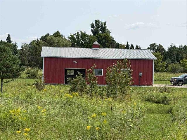 6397 Pickerel Dr, Alanson, MI 49706