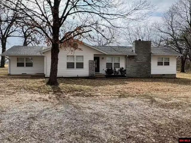 6392 HIGHWAY 62 W, GASSVILLE, AR 72635 Single Family Residence.