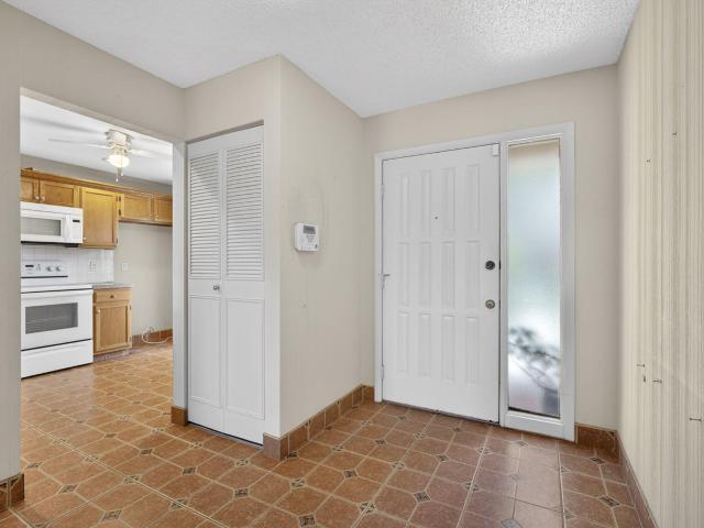 67 Macadamia Ct, Royal Palm Beach, FL 33411 | MLS #B26019 | Compass