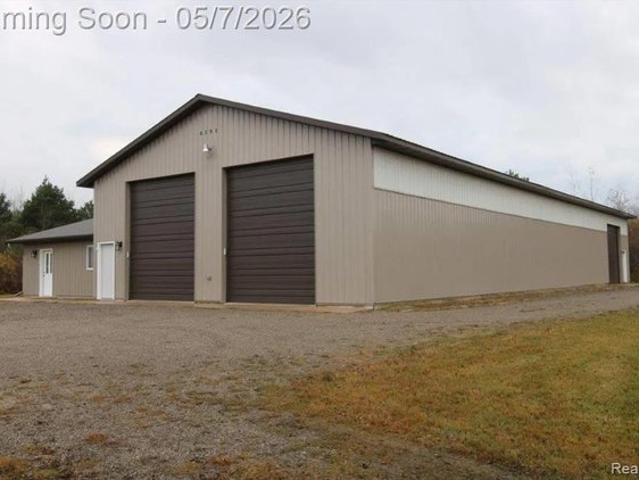 6595 Little Canada Rd, Benton Township, MI 49721