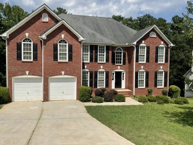 6657 Point of Woods Dr, Stone Mountain, GA 30087