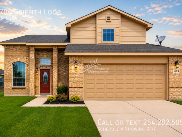 6704 Griffith Loop, 4 beds, 2 full and 1 half baths