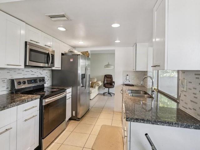 6708 NW 57th Dr, Tamarac, FL 33321 | MLS #F10541 | Compass