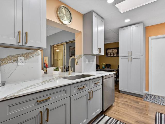 6719 NW 70th Ct, Tamarac, FL 33321 | MLS #A11986 | Compass