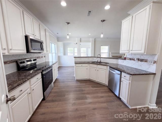 6767 Thistle Down Dr, Harrisburg, NC 28075 | MLS #4373 | Compass