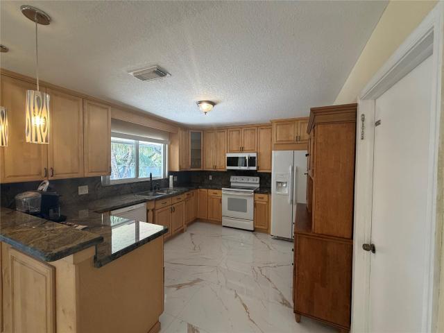 6791 NW 32nd Ave, Fort Lauderdale, FL 33309 | MLS #F10549 | Compass