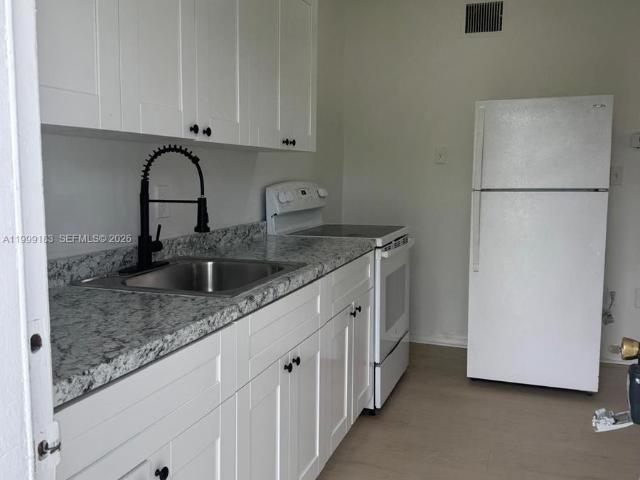 680 NE 88th Ter, Unit 6, Miami, FL 33138 | MLS #A11999 | Compass