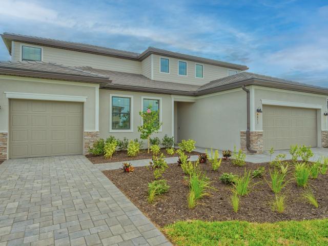 6 Bed 4 1/2 Bath Gem With Next Gen Suite In The Highly Sought After Lorraine Lakes Neighborhood In Lakewood Ranch!