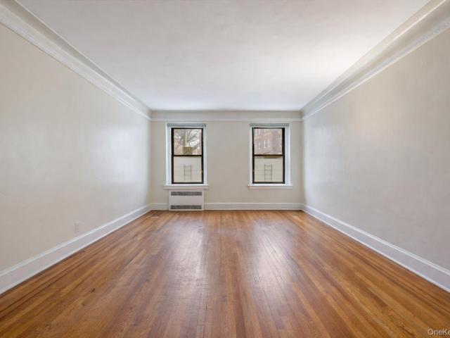 73 20 Austin Street, Unit 1E | Compass