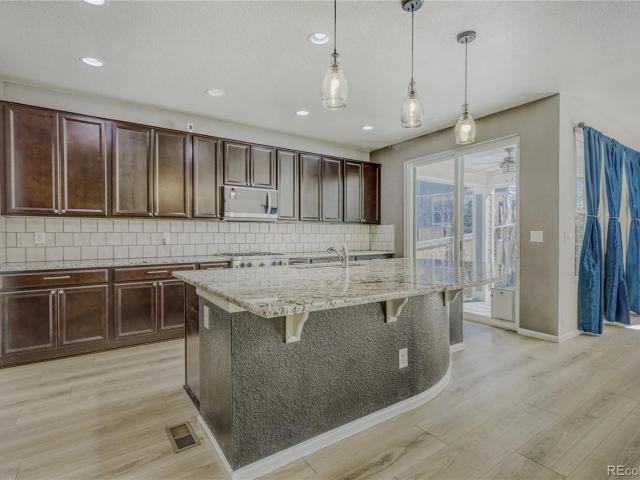 7018 E 123rd Pl, Thornton, CO 80602 | MLS #4026 | Compass