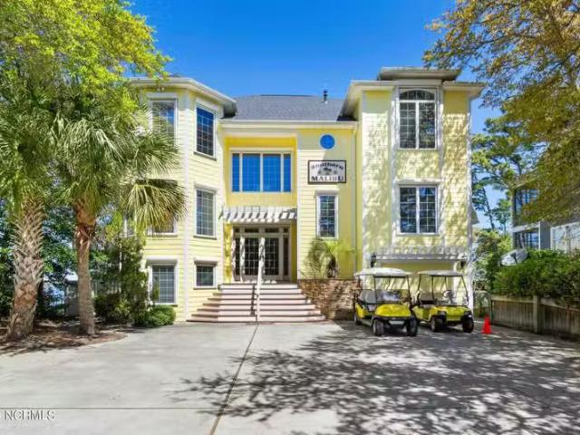 7012 SOUND DR, EMERALD ISLE, NC 28594 Single Family Residence.