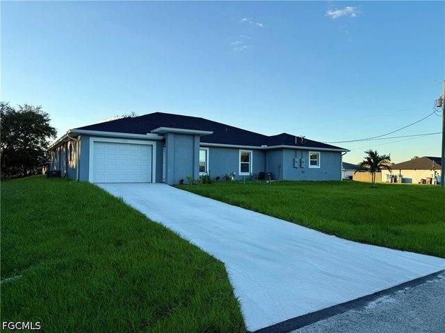 701 703 Gordon Ave S, Lehigh Acres, FL 33973