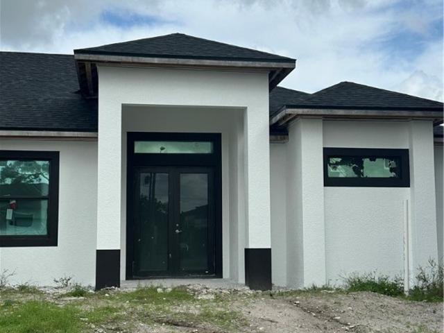 703 Coolidge Ave, Lehigh Acres, FL 33936 | MLS #225016 | Compass