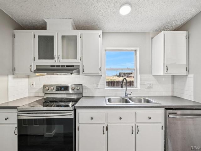 7041 Ash Ct, Commerce City, CO 80022 | MLS #7067 | Compass