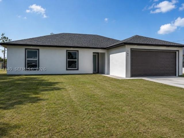 704 Carbon St E, Lehigh Acres, FL 33974