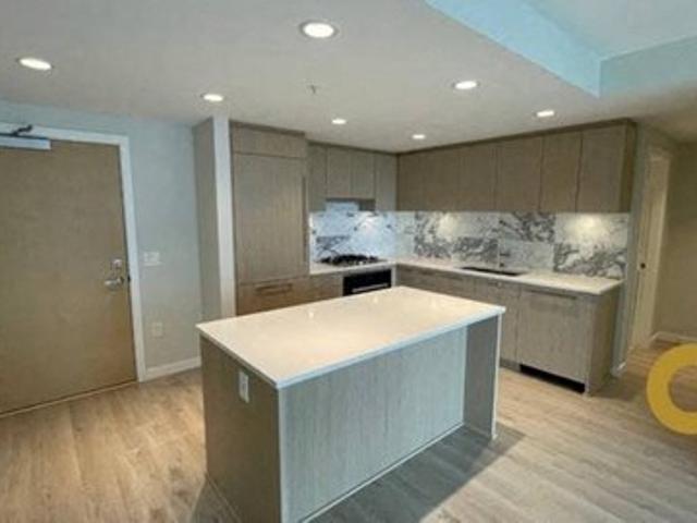705 3699 Sexsmith Road 2/2 891 sqft