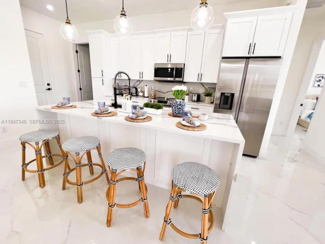 707 Tropicana Pkwy E, Cape Coral, FL 33909 | MLS #A11847