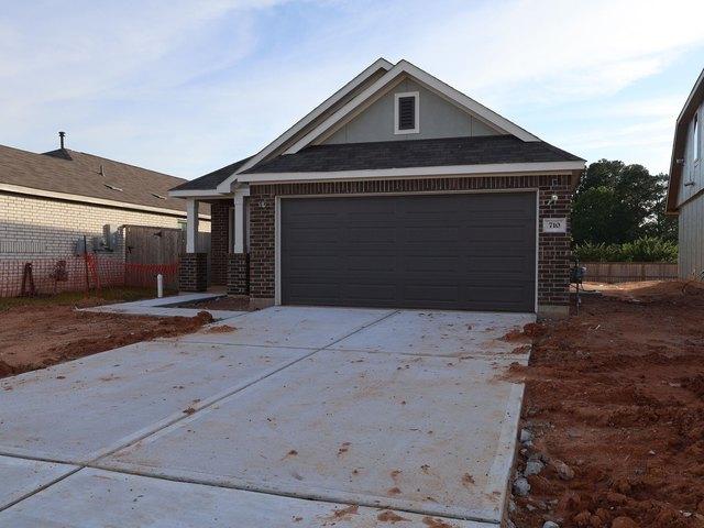 710 Falling Cave Dr, Willis, TX 77378