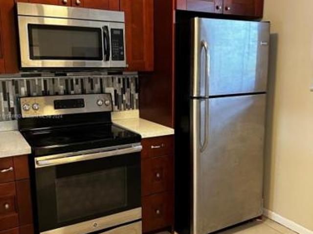 713 NW 103rd Terrace #203, Pembroke Pines, FL 33026