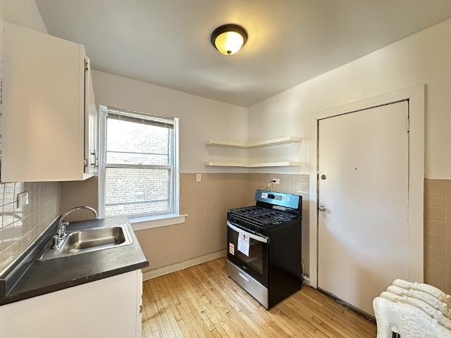 7147 S Constance Ave, Unit 2E, Chicago, IL 60649 | MLS #12570