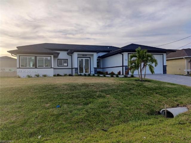 716 NW 37th Ave, Cape Coral, FL 33993 | MLS #226014 | Compass