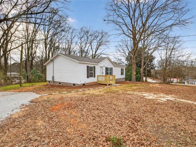 720 Woodland Cir, Loganville, GA 30052 | MLS #7724 | Compass