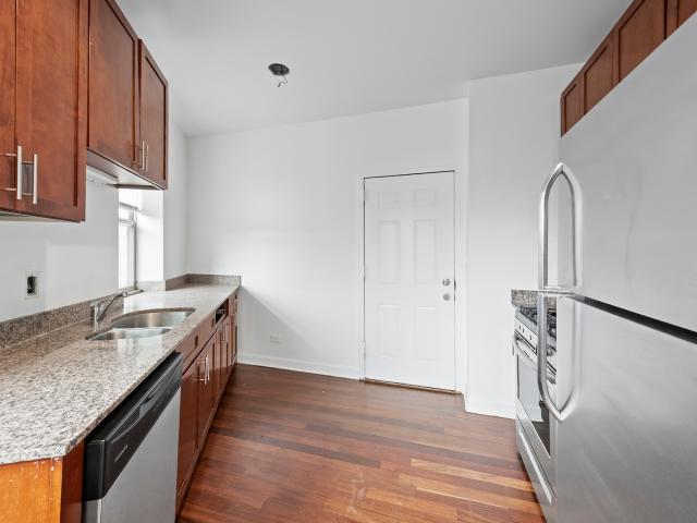 7227 N Rogers Ave, Unit 1W, Chicago, IL 60645 | MLS #12608 | Compass