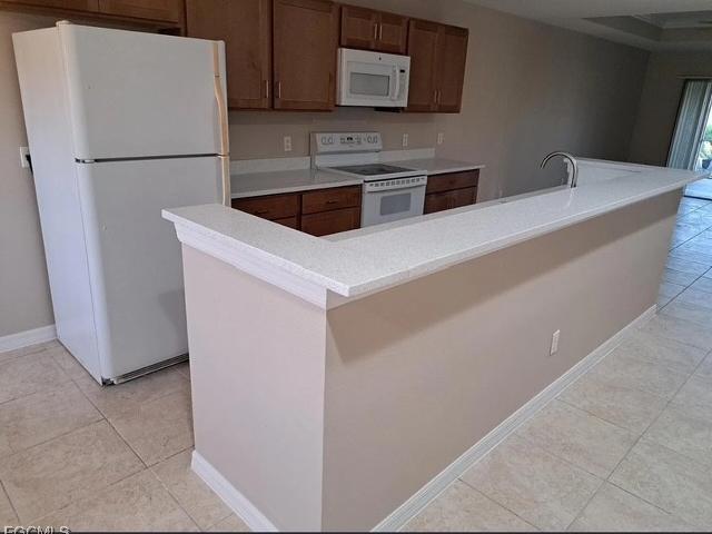 724 SW 35th St, Cape Coral, FL 33914 | MLS #2026005 | Compass
