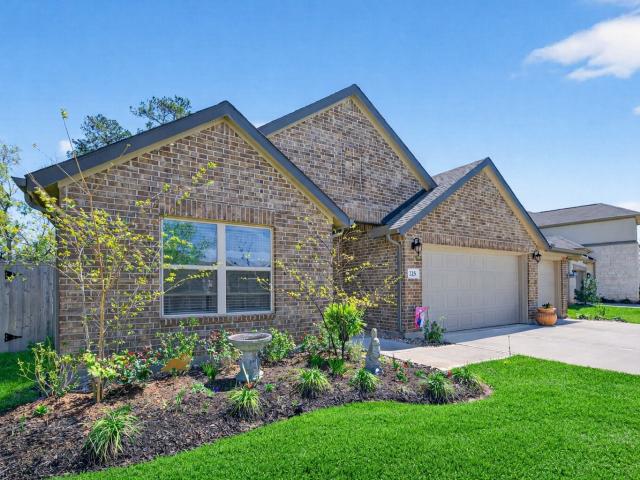 725 Ivory Crk Ct, Willis, TX 77378 | MLS #81273 | Compass