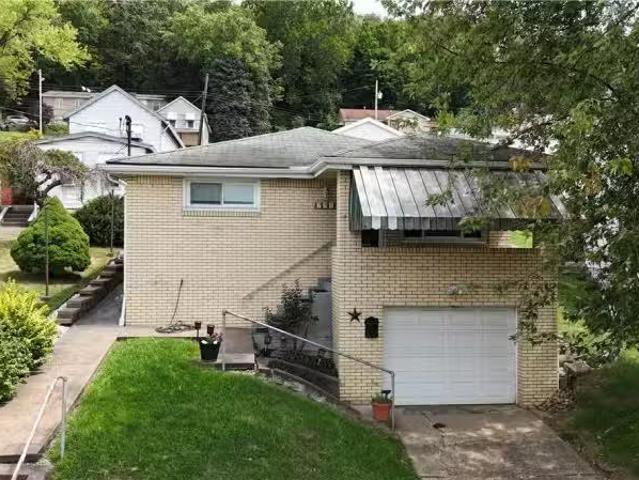 731 DELAWARE AVE, GLASSPORT, PA 15045 Single Family Residence.