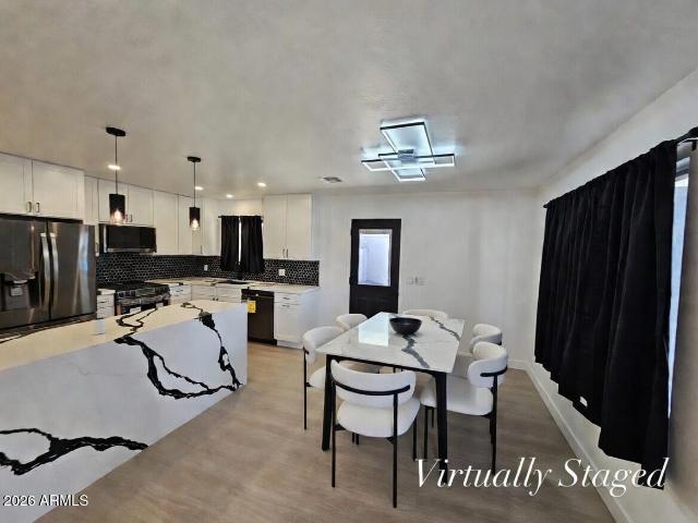 7323 N 16TH Place
