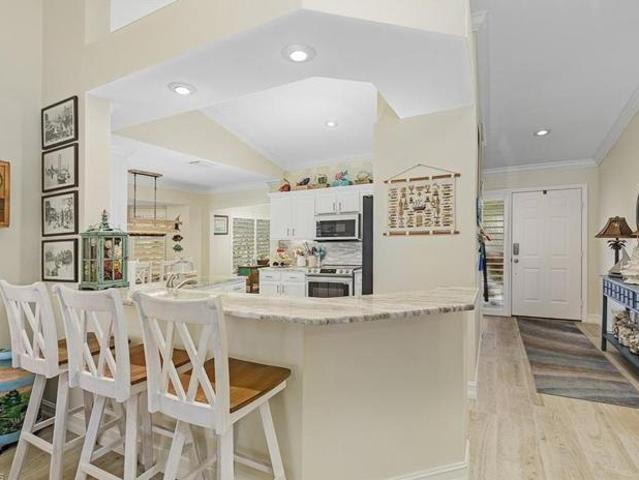 737 Wiggins Lake Dr #202, Naples, FL 34110