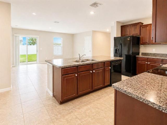 7406 Rosy Periwinkle Ct, Tampa, FL 33619 | MLS #TB8501 | Compass
