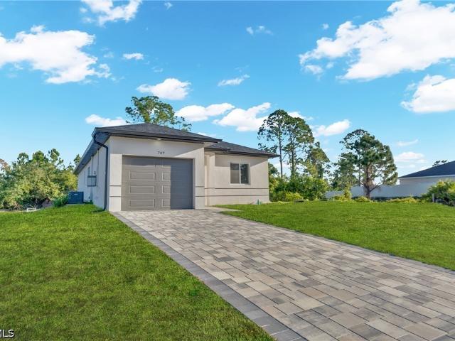 747 Newell St E, Lehigh Acres, FL 33974 | MLS #2026016 | Compass