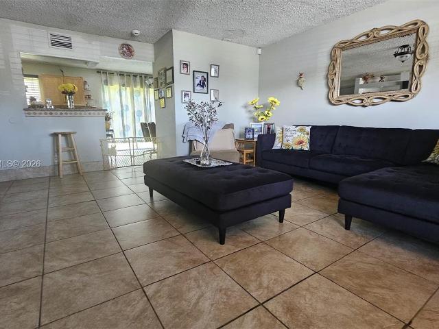 7501 Kimberly Blvd, Unit 104, North Lauderdale, FL 33068 | MLS #A11859