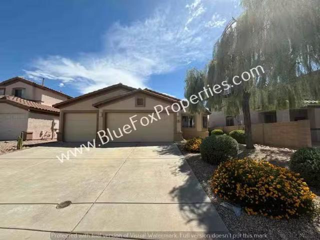 7523 W Beltran Pl