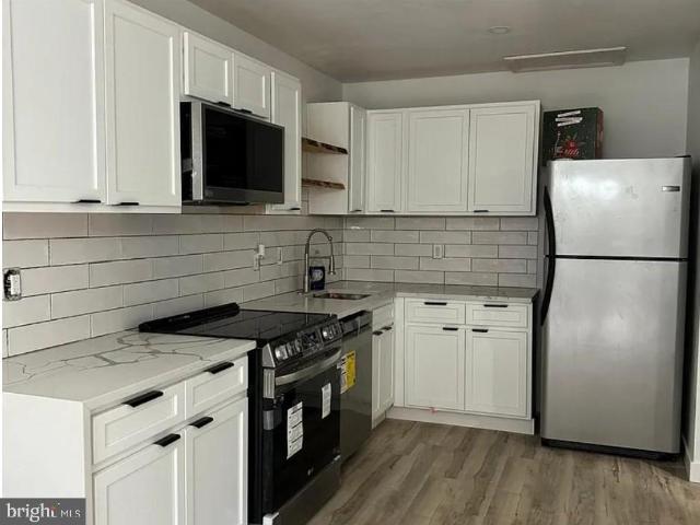 7556 Woodbine Dr, Laurel, MD 20707 | MLS #MDPG2196 | Compass