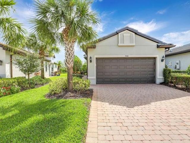 7594 Jacaranda Ln, Naples, FL 34114
