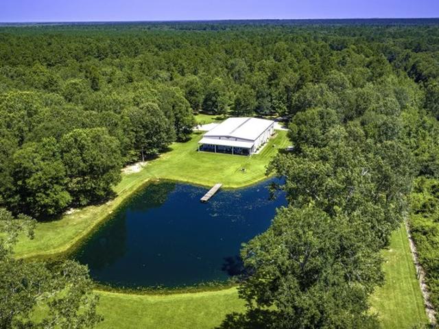 766 County Road 2125, Cleveland, TX 77327