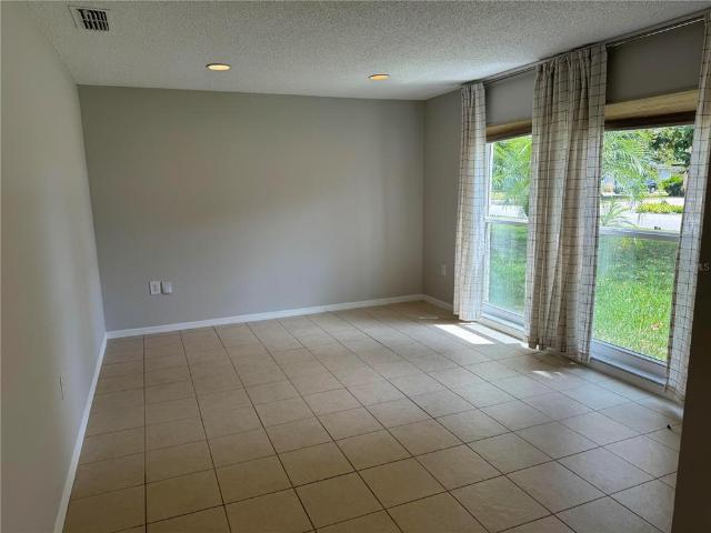 7679 Persian Ct, Orlando, FL 32819 | MLS #O6390 | Compass