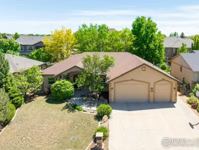 7704 POUDRE RIVER RD, GREELEY, CO 80634 Single Family Residenc.
