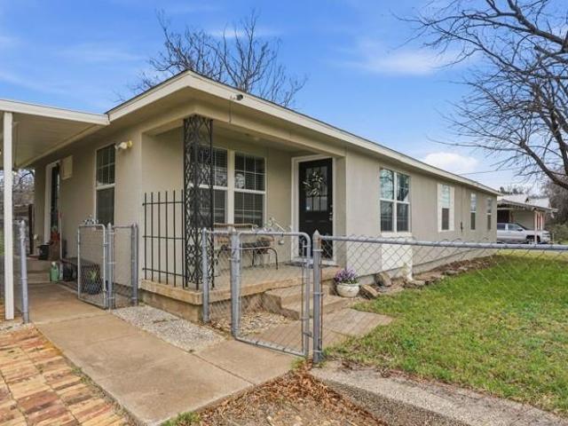 7701 John T White Road
