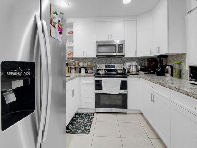 7703 Camino Real, Unit A111, Miami, FL 33143 | MLS #A11956 | Compass