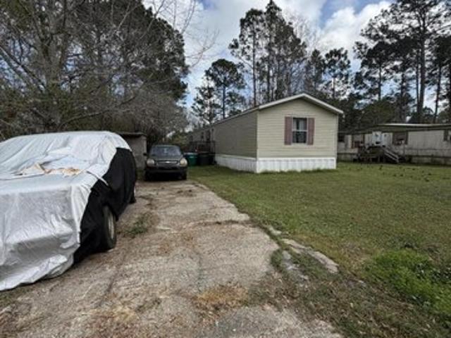 7724 Boulder Dr, Gautier, MS 39553