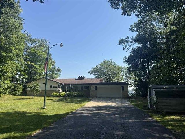 7760 Paradise Trl, Carp Lake, MI 49718