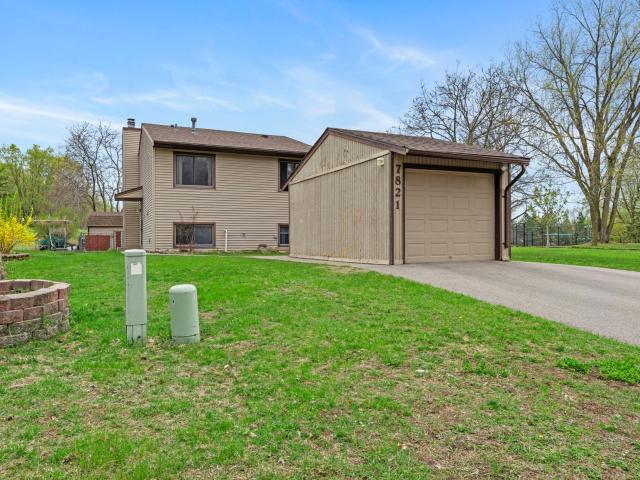 7821 Rimbley Rd, Woodbury, MN 55125 | MLS #7048 | Compass