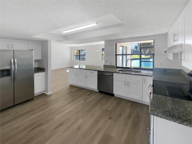7846 Cayuga Dr, New Port Richey, FL 34653 | MLS #O6371 | Compass