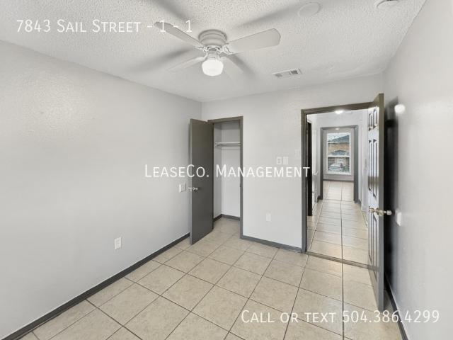 7843 Sail Street 1, 3 beds, 1 full and 1 half bath
